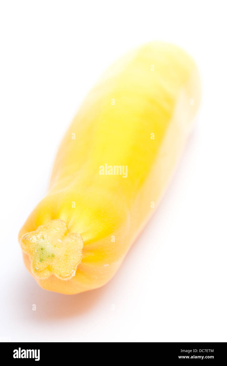 Yellow courgette in vertical format on a white background Stock Photo ...