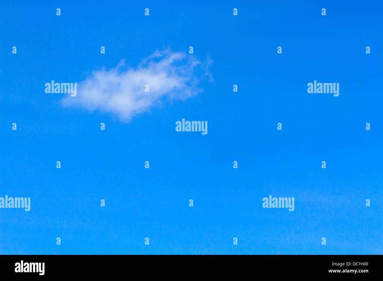 Single clouds in blue sky Stock Photo - Alamy