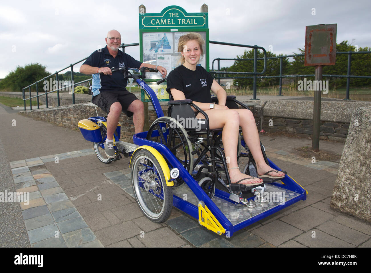 Nigel Wigget is seen here riding the special low loader bike with Emily ...