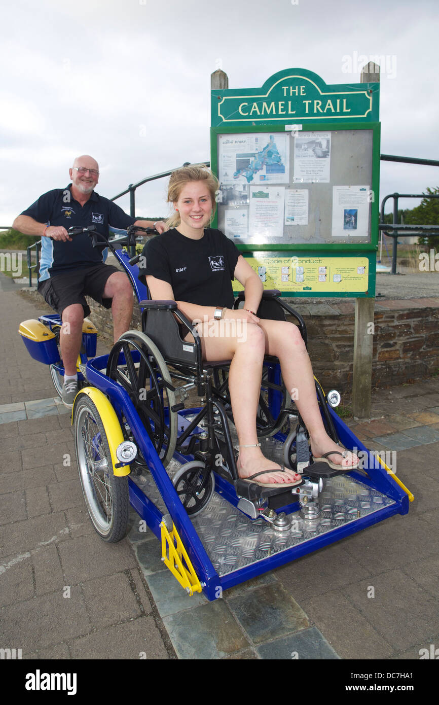 Nigel Wigget is seen here riding the special low loader bike with Emily ...