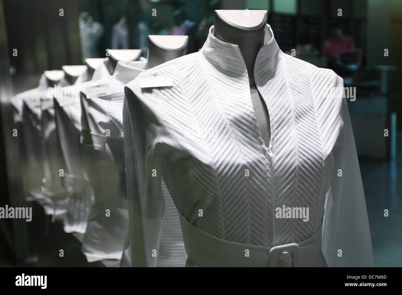 showcase with white clothes Stock Photo - Alamy