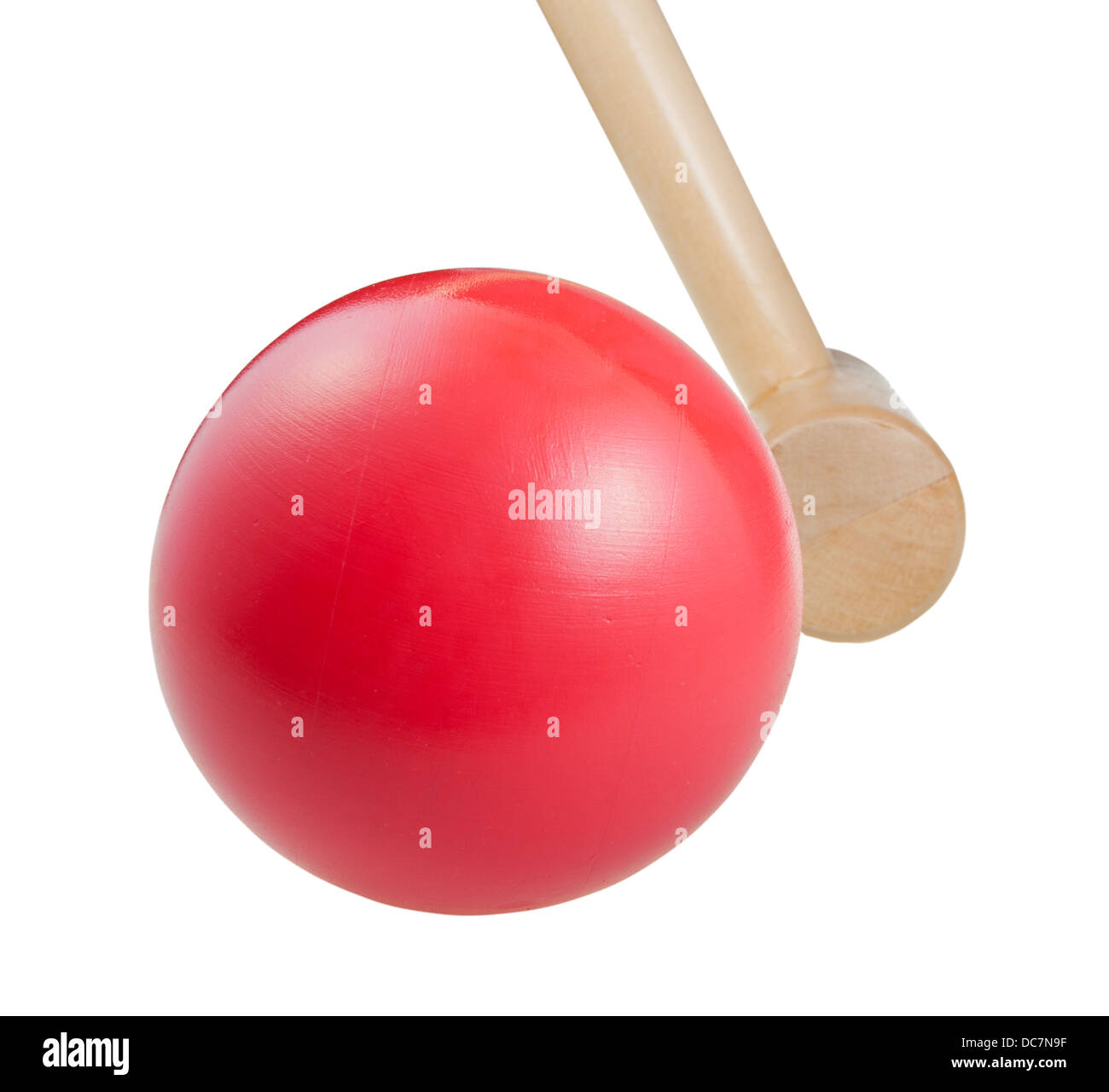 croquet red ball and wooden mallet close up isolated on white ...