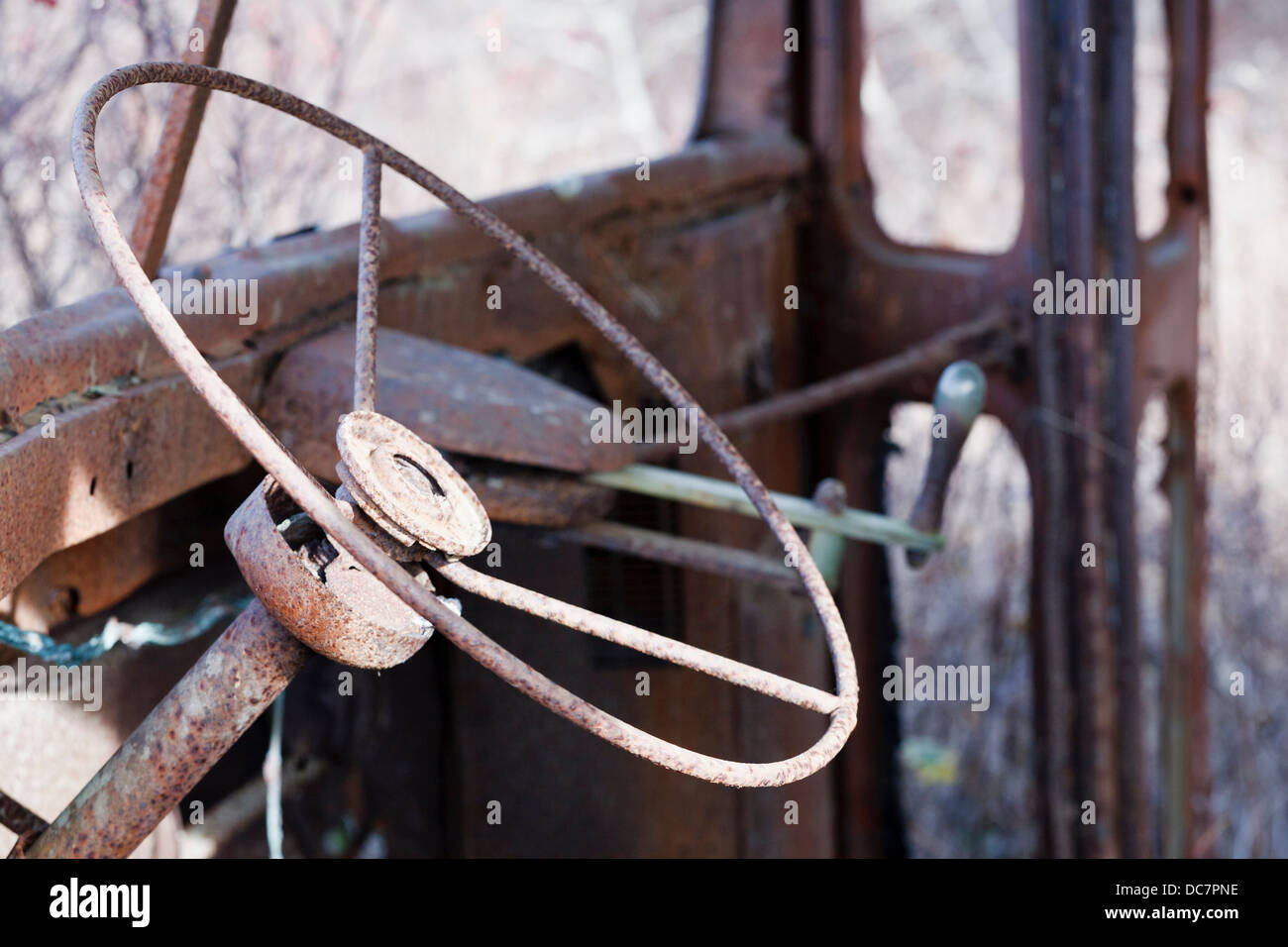 Burned and rusted bus steering wheel Stock Photo - Alamy