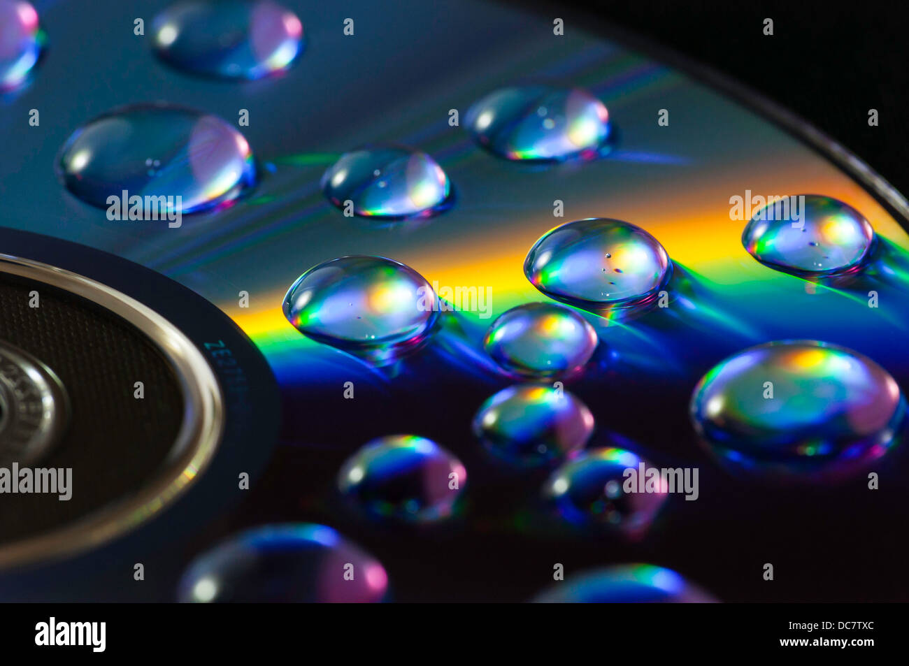 Water drops on CD Stock Photo - Alamy
