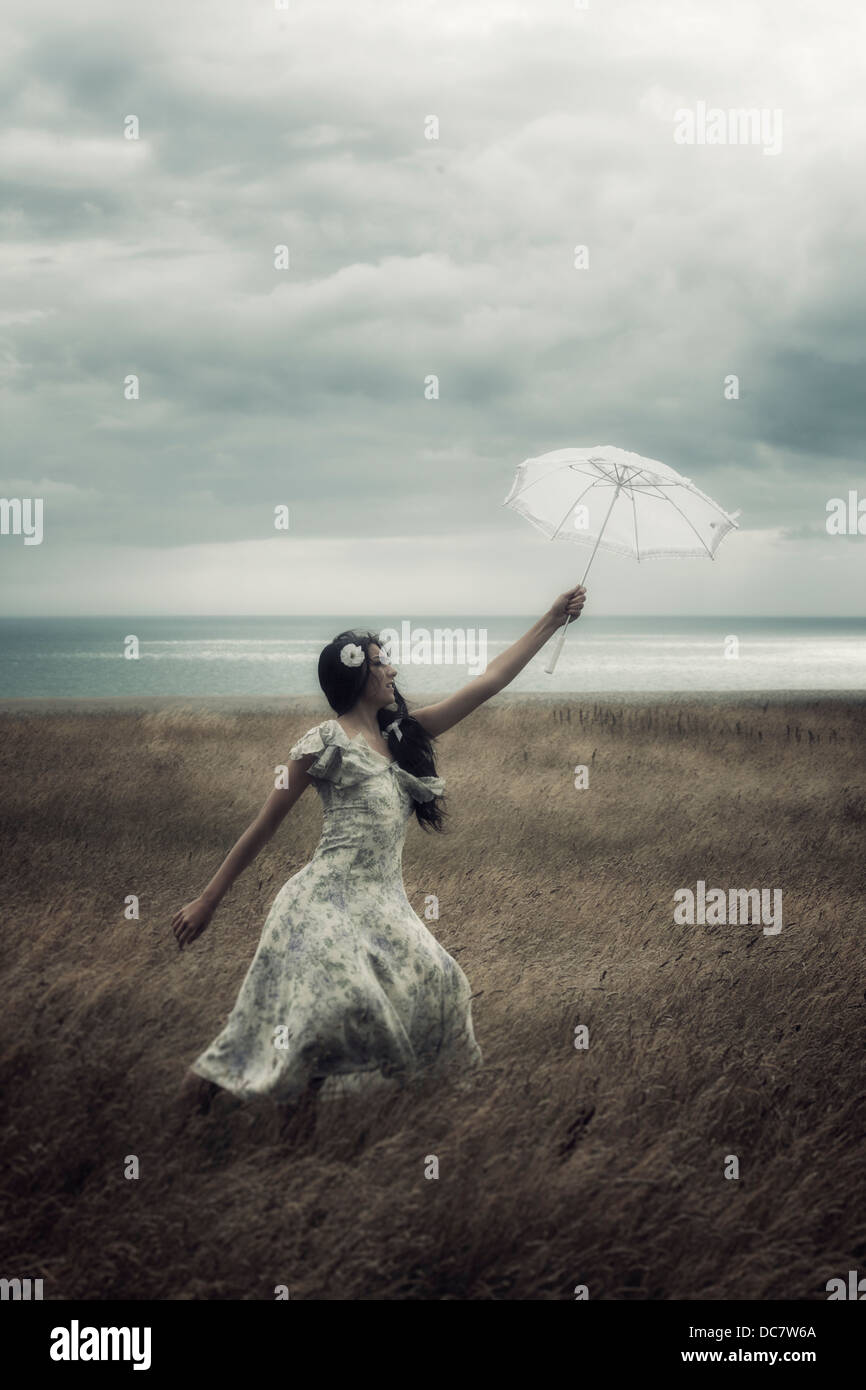 Woman wind dress High Resolution Stock Photography and Images - Alamy