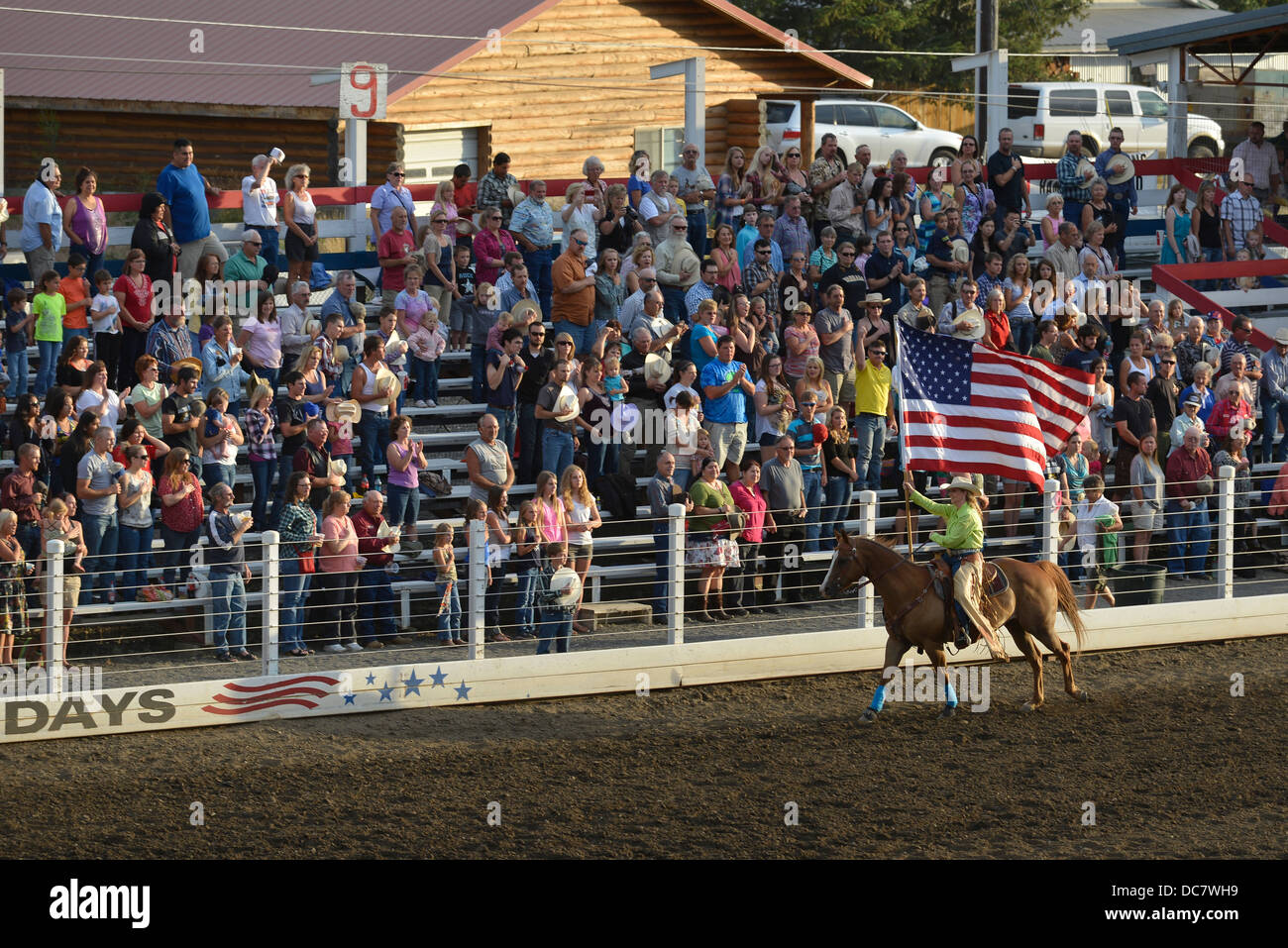Rodeo queen with an American flag at the Chief Joseph Days Rodeo in ...