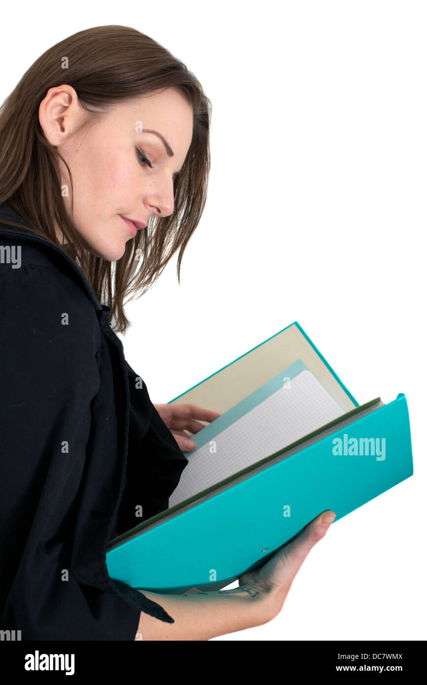Young Female Student With A Folder/Binder Reading from it Stock Photo ...