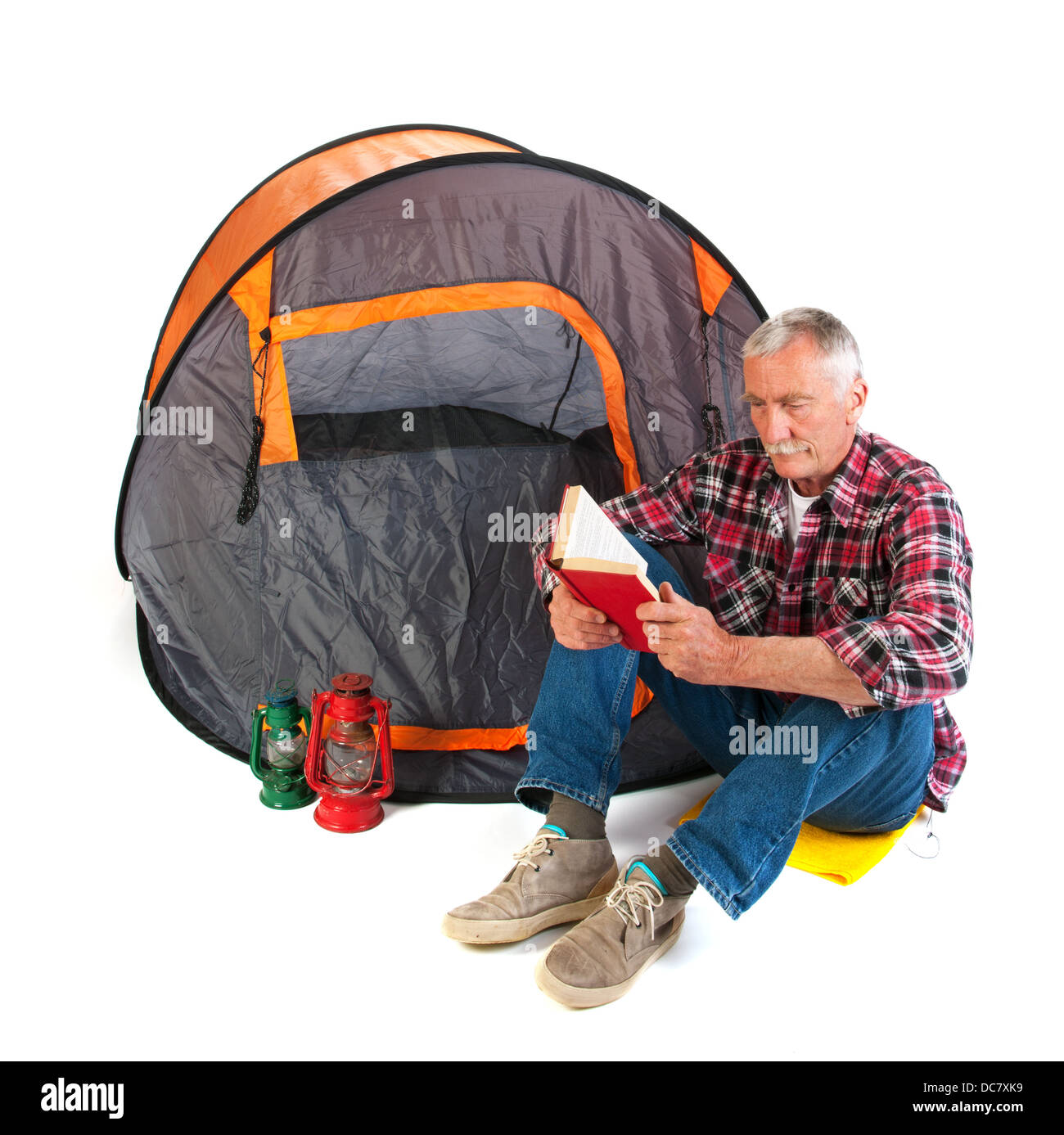 Elderly reading Cut Out Stock Images & Pictures - Alamy