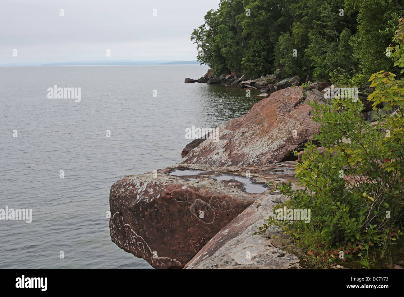 Rocks jutting out on the shore of Stockton Island in the Apostle ...