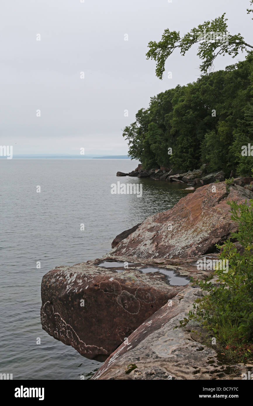 Rocks jutting out on the shore of Stockton Island in the Apostle ...