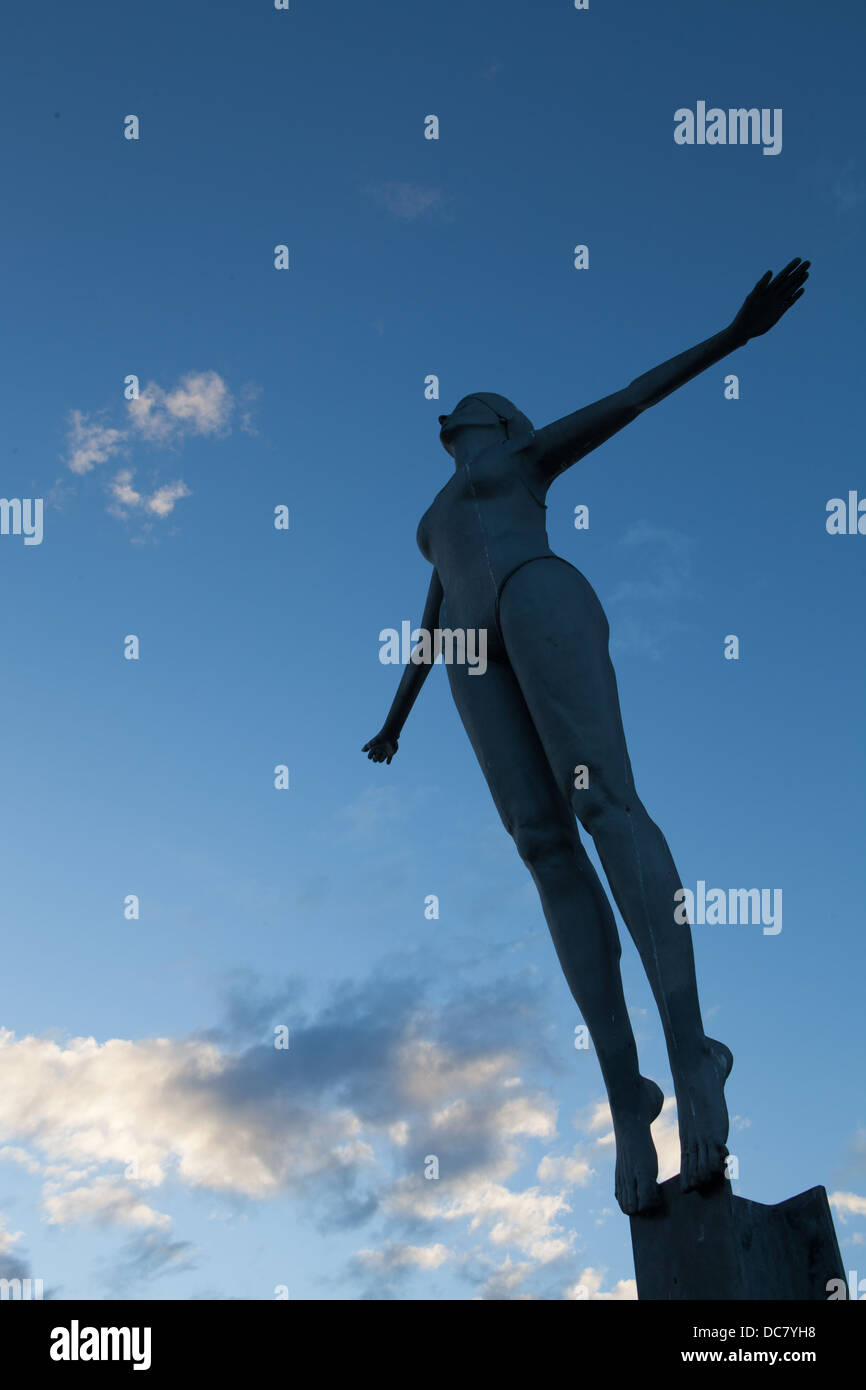 Scarborough Bathing Bell statue on Vincent pier with lighthouse in the ...