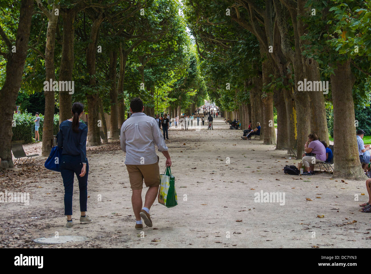 Paris, France, Couples Walking Away on Path in City Park, Jardin des ...