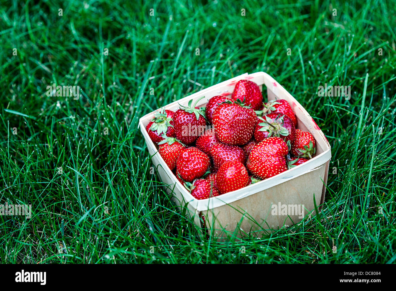 Strawberry inside wooden basket Stock Photo - Alamy