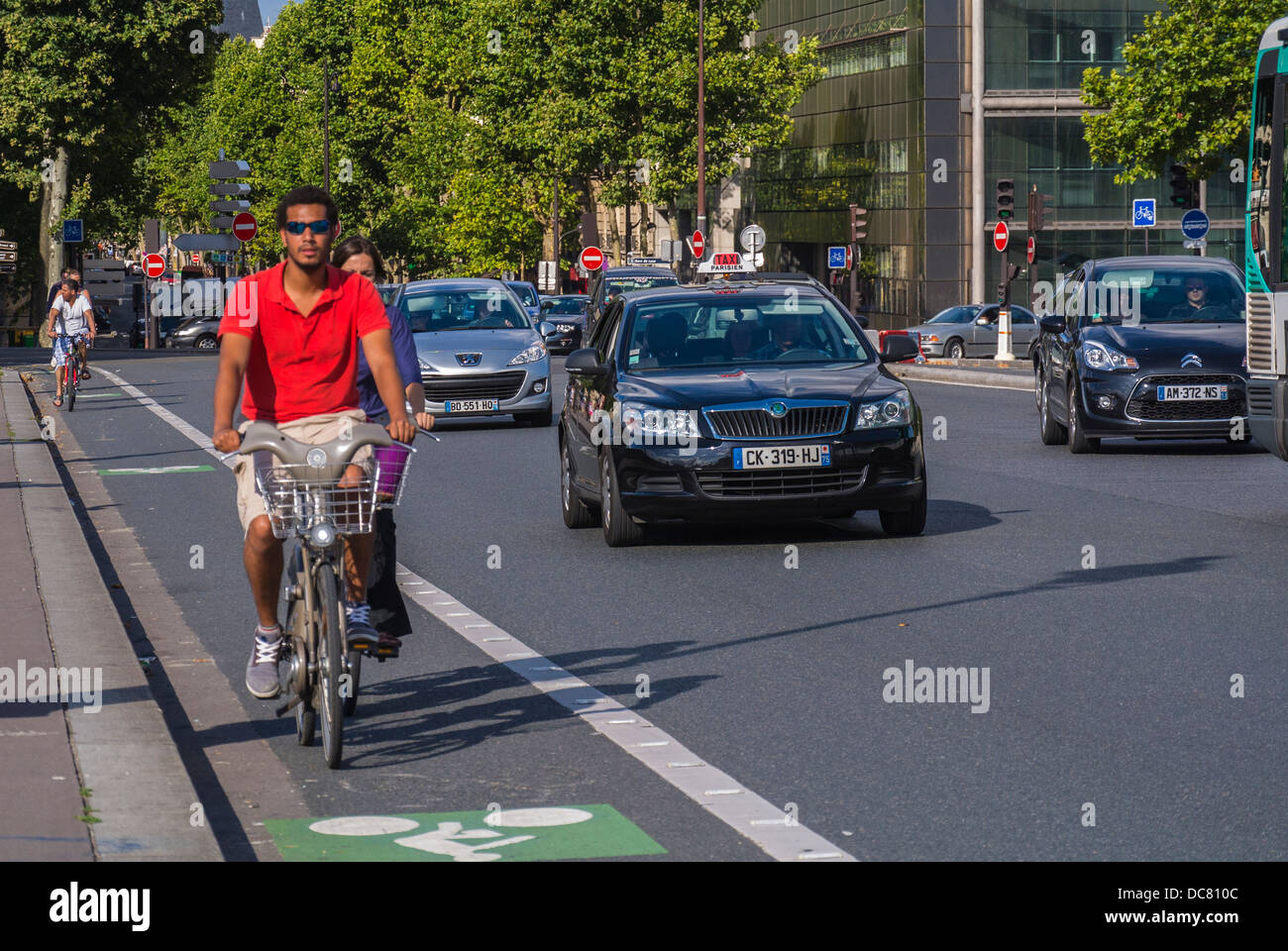 Paris, France, People Cycling in Urban Street, Bicycle lane, Using ...