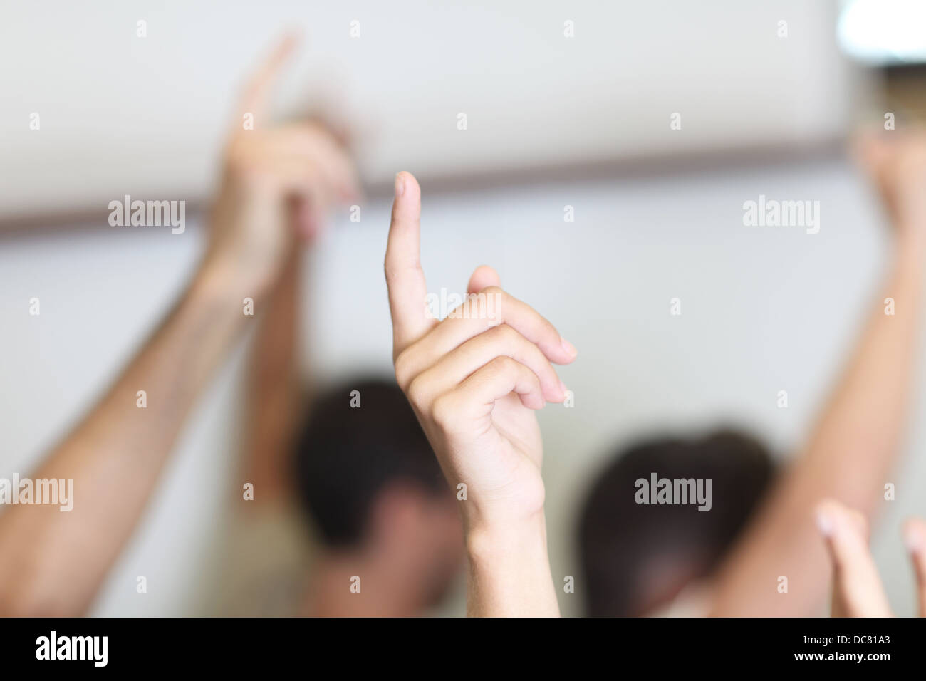 Group of people putting hands up hi-res stock photography and images ...
