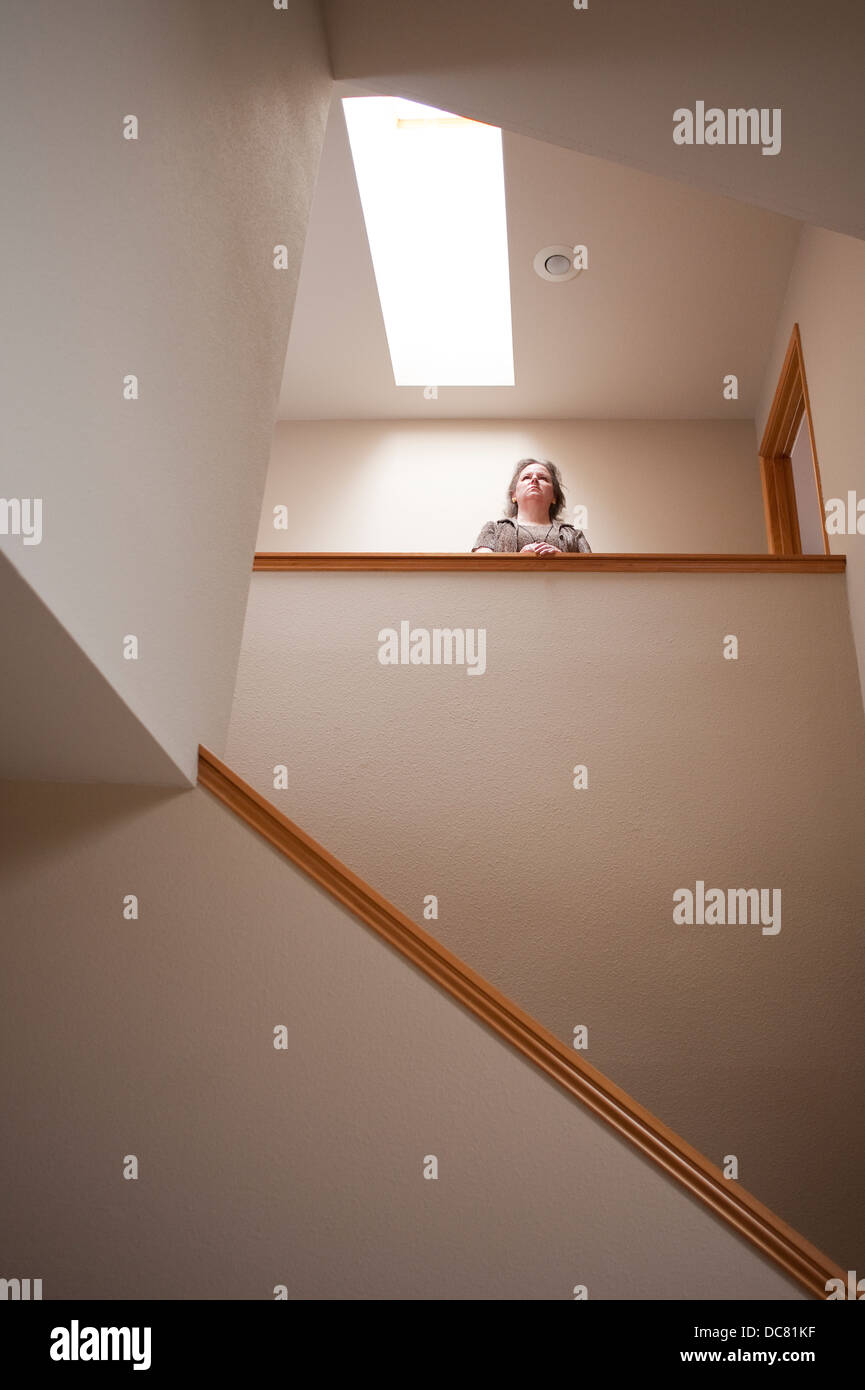 Woman portrait standing under skylight Stock Photo - Alamy
