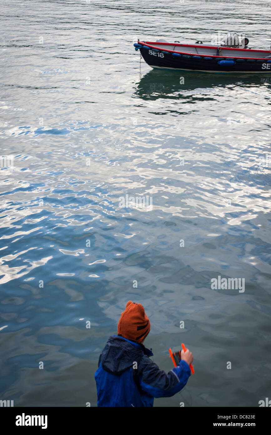 Crab line fishing (Crabbing) at Salcombe, South Devon, UK Stock Photo ...