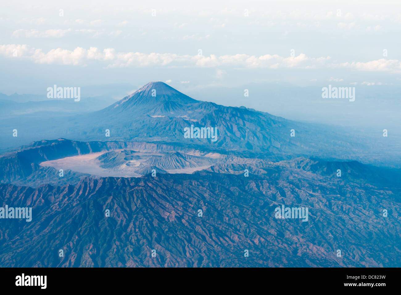 Big volcano crater with other volcano top on background, bird's eye ...