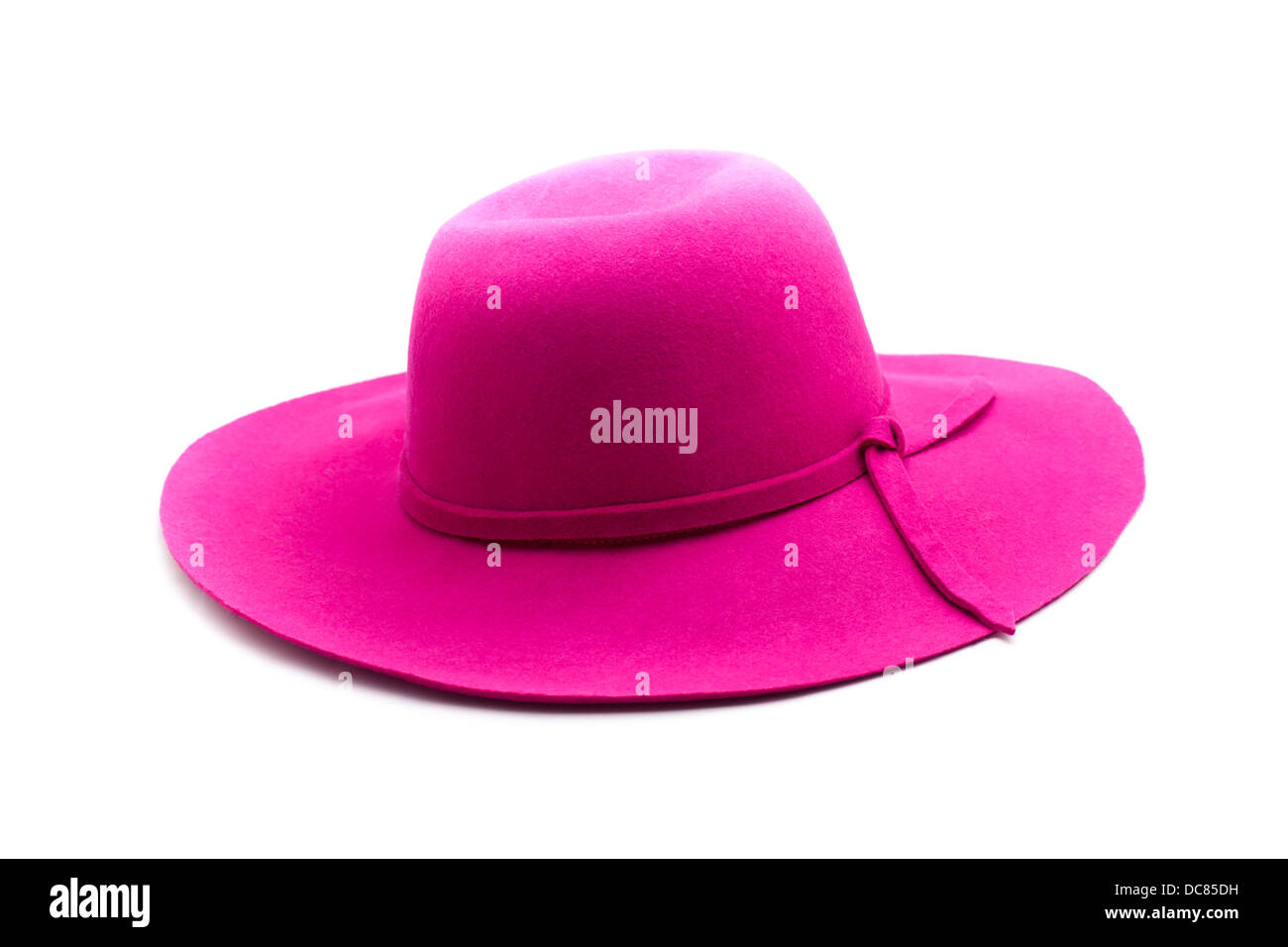 Pink hat on white background Stock Photo - Alamy