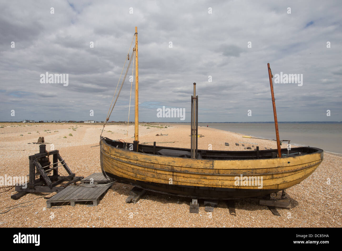 Pebble beach with boat hi-res stock photography and images - Alamy