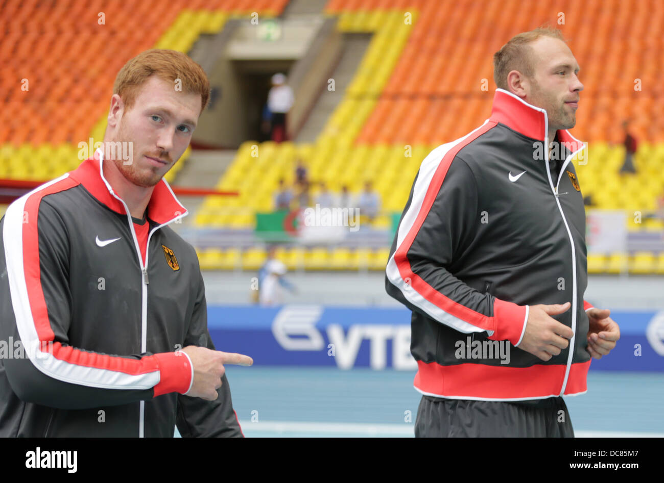 Moscow, Russia. 12th Aug, 2013. Christoph Harting (l) of Germany points ...