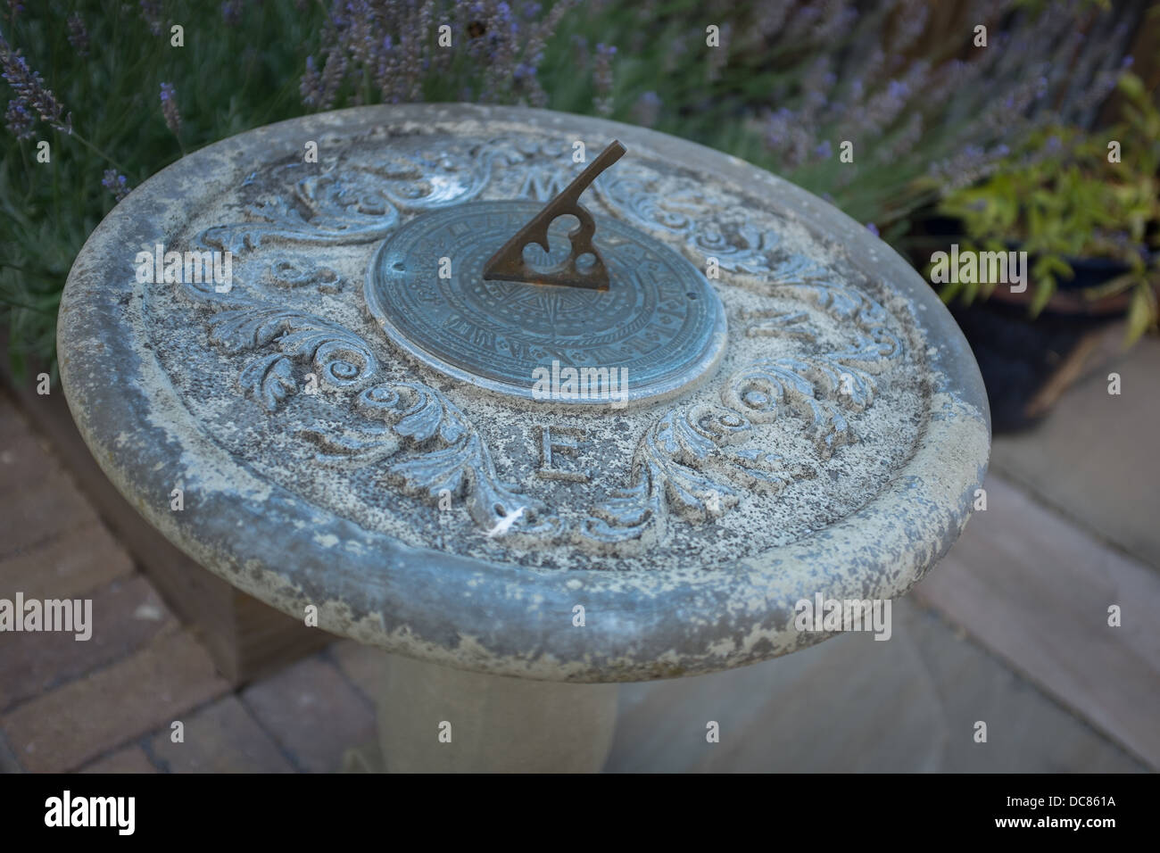 Vintage sundial in a garden Stock Photo - Alamy