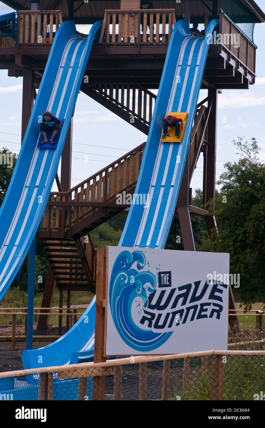 Children Sliding Down a Waterslide At Knockhatch Adventure Park Near ...