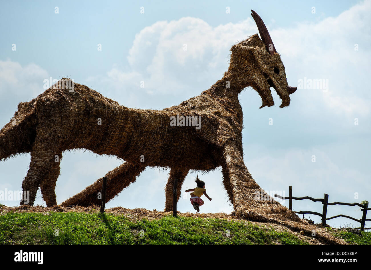 Bohemian Paradise, Karlovice. 10th Aug, 2013. One of the straw statues is seen within the Straw ...