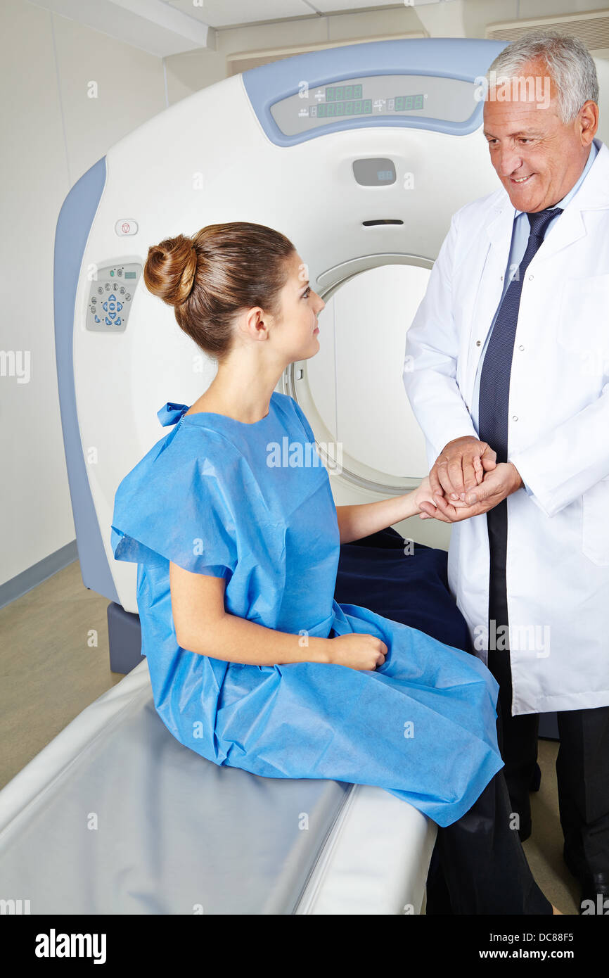 Doctor caring for young patient at MRI therapy Stock Photo - Alamy