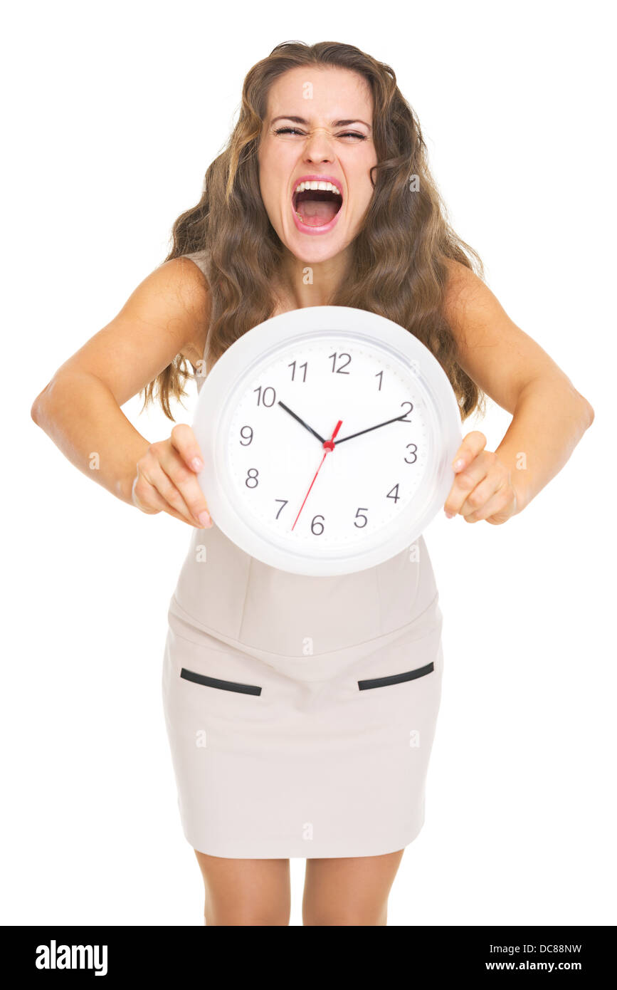Young woman showing clock Stock Photo - Alamy