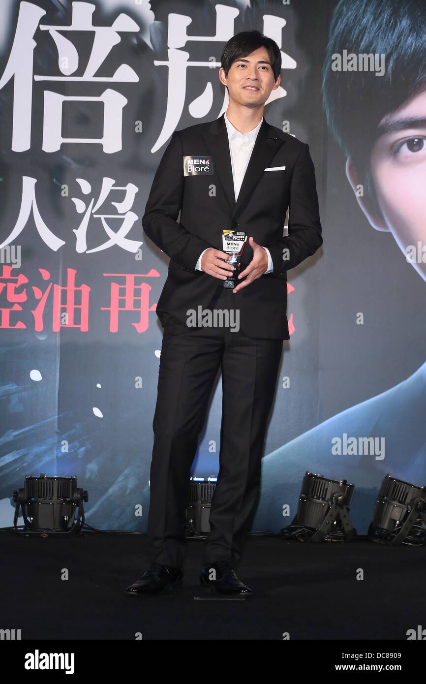 Actor Vic Chou attends promotion activity of Biore in Taipei,China on Friday August 9,2013 Stock ...