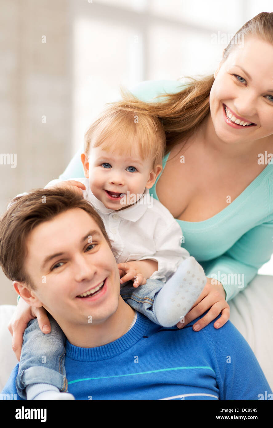 happy parents playing with adorable baby Stock Photo - Alamy