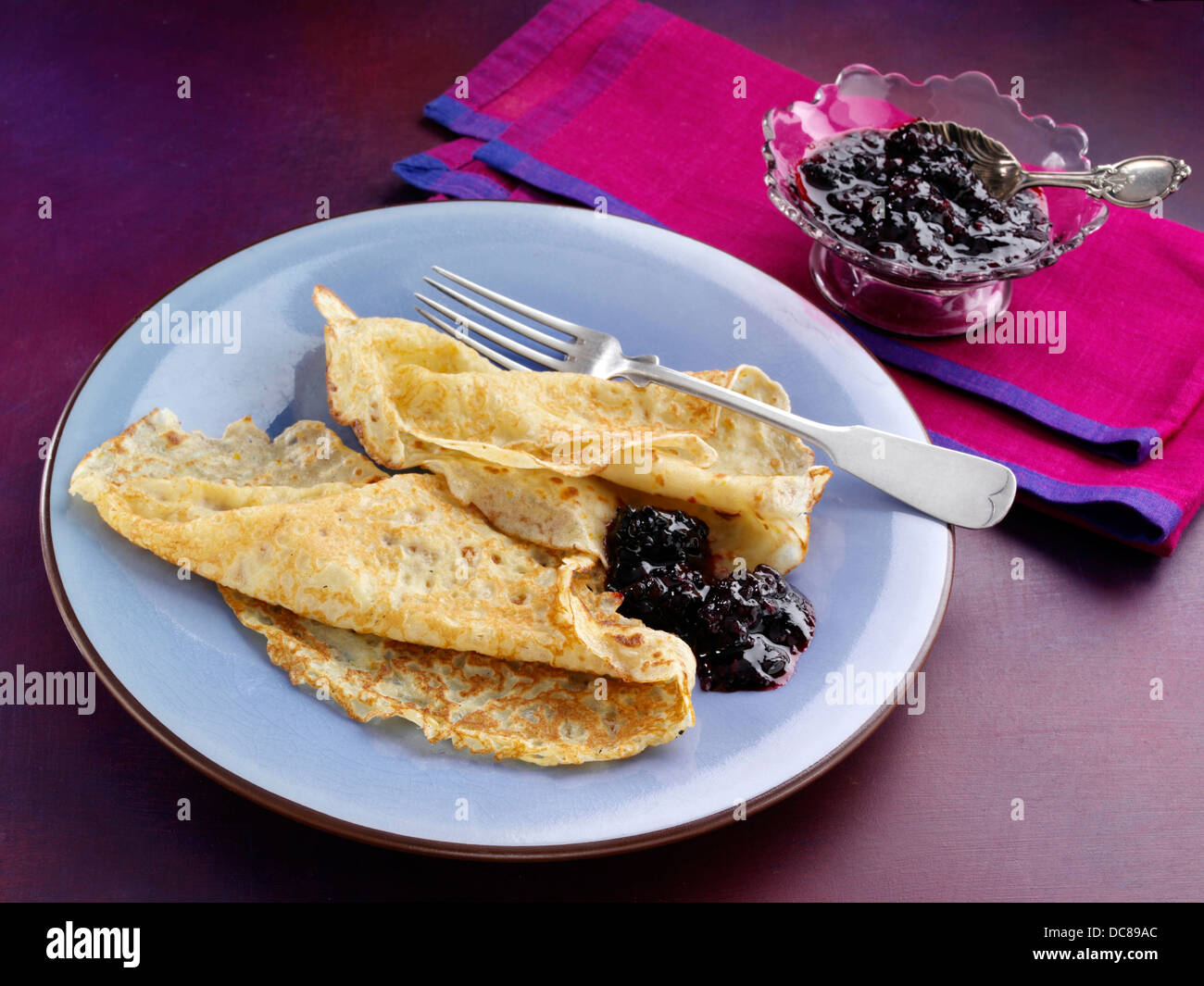 Shrove tuesday pan fried crepes blackberry jam hi-res stock photography ...