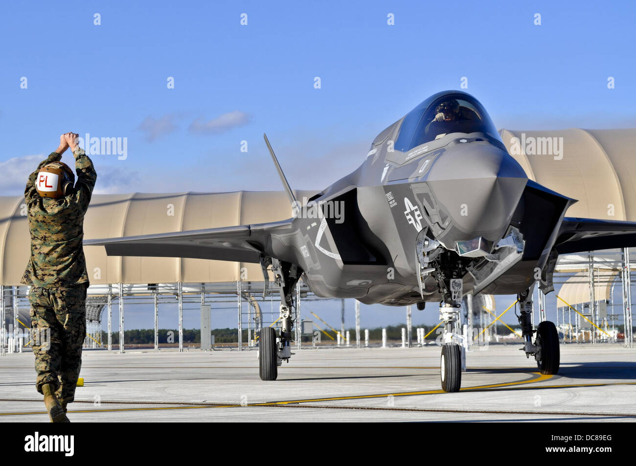 US Marine Gunnery Sgt. Matthew Smith marshals in the first Marine Corp ...