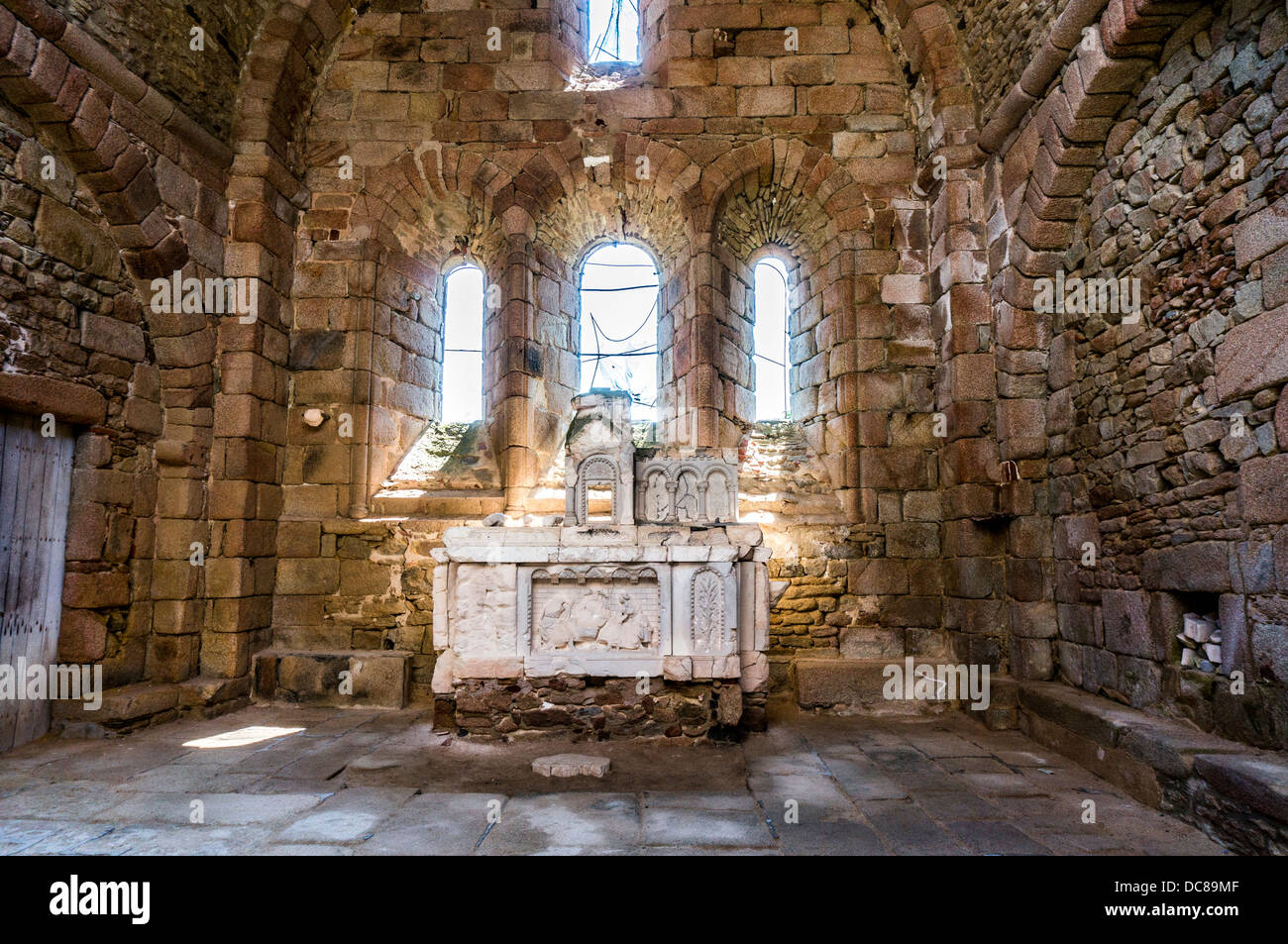 The main altar of the church in the ruins of Oradour-sur-Glane village ...
