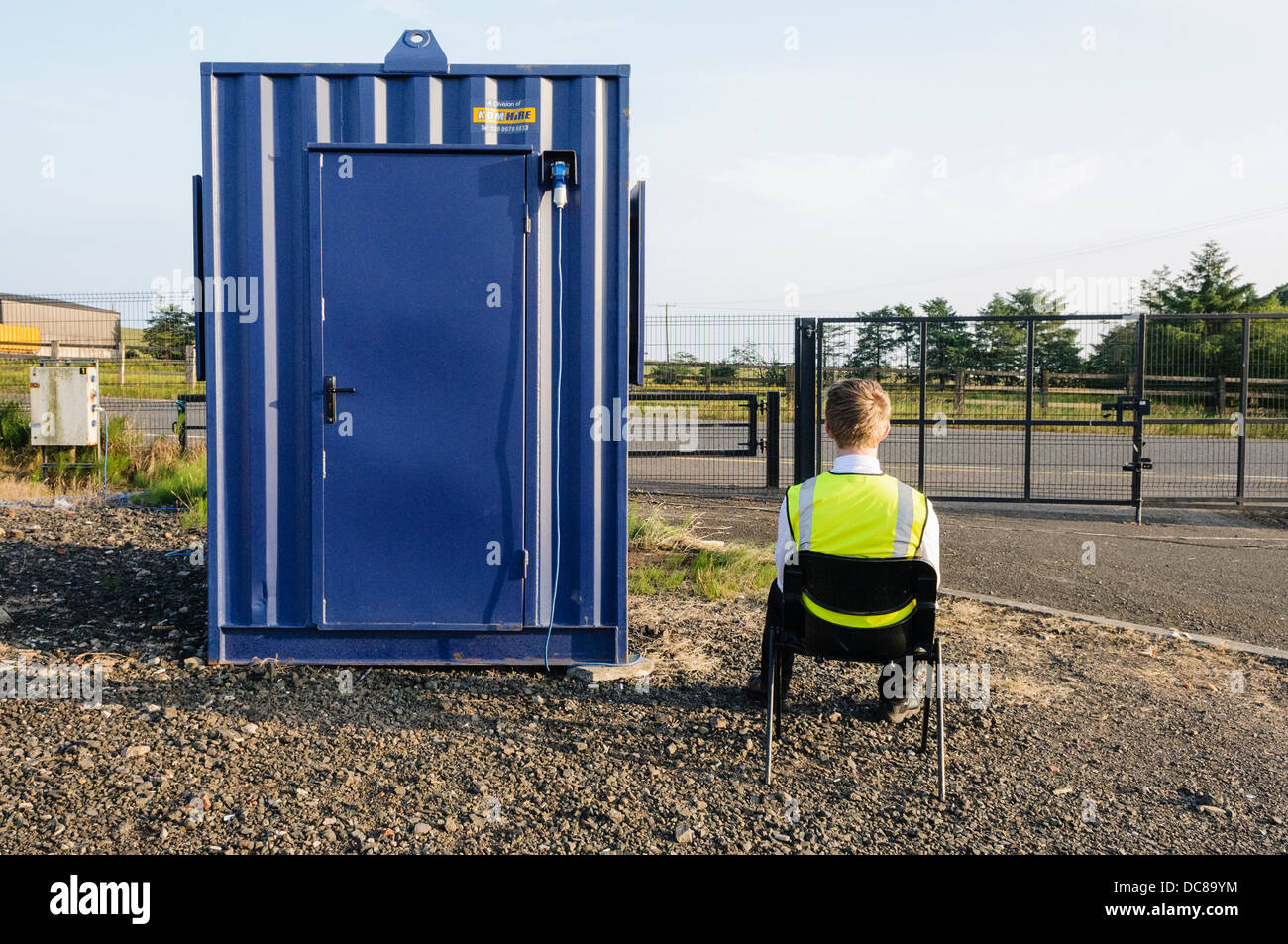 Security guard sitting on chair hi-res stock photography and images - Alamy
