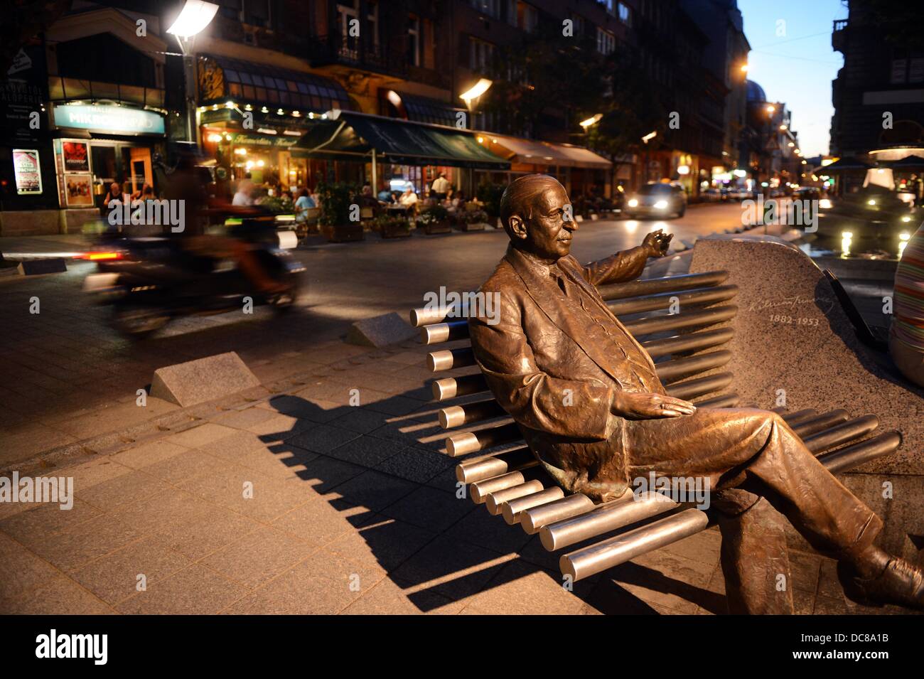 A statue shows the Hungarian composer Emmerich Kalman sitting on a ...