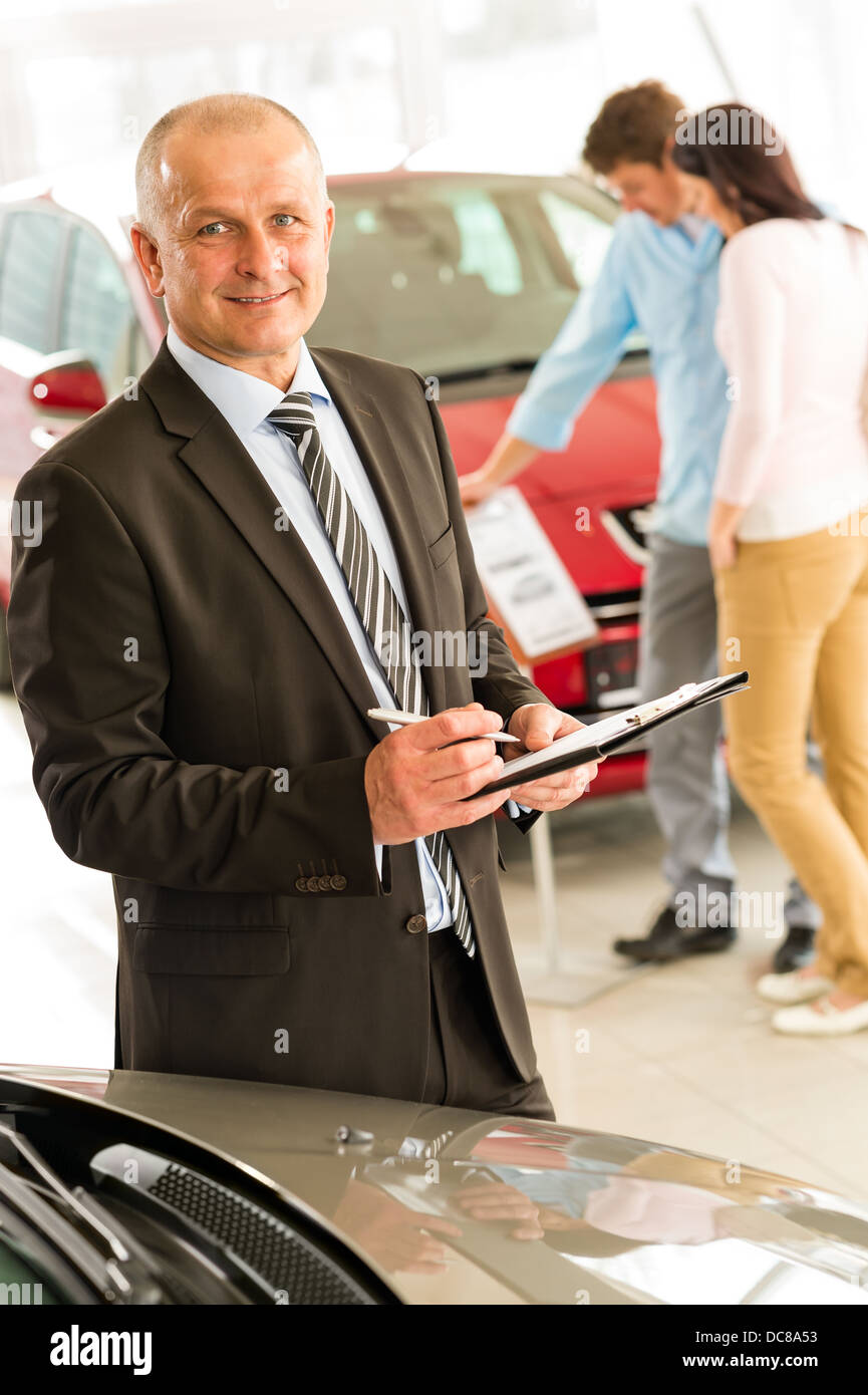 Closeup portrait of salesman working in car dealership Stock Photo - Alamy