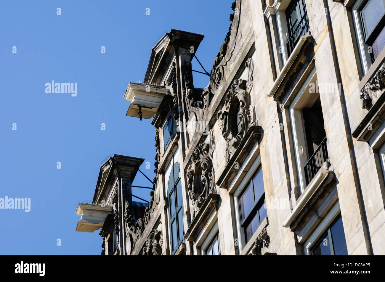 Hooks on the roof of an ornate house in Amsterdam Stock Photo - Alamy