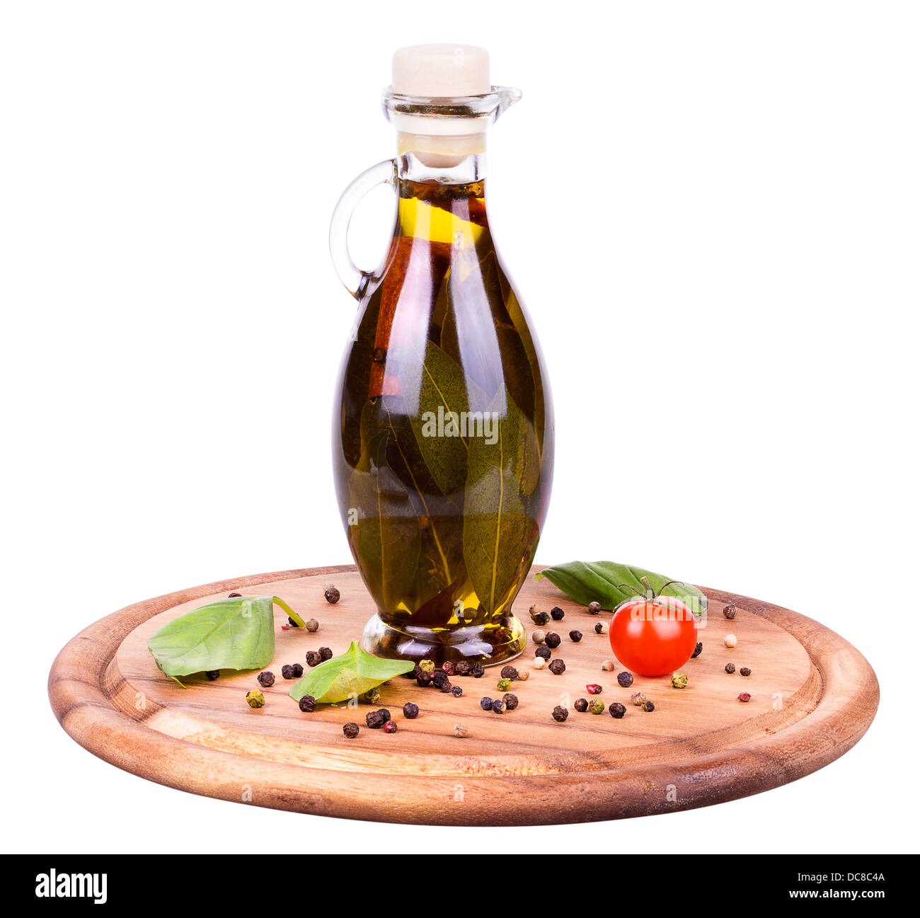 olive vegetable oil in glass and cherry tomato isolated on white Stock ...