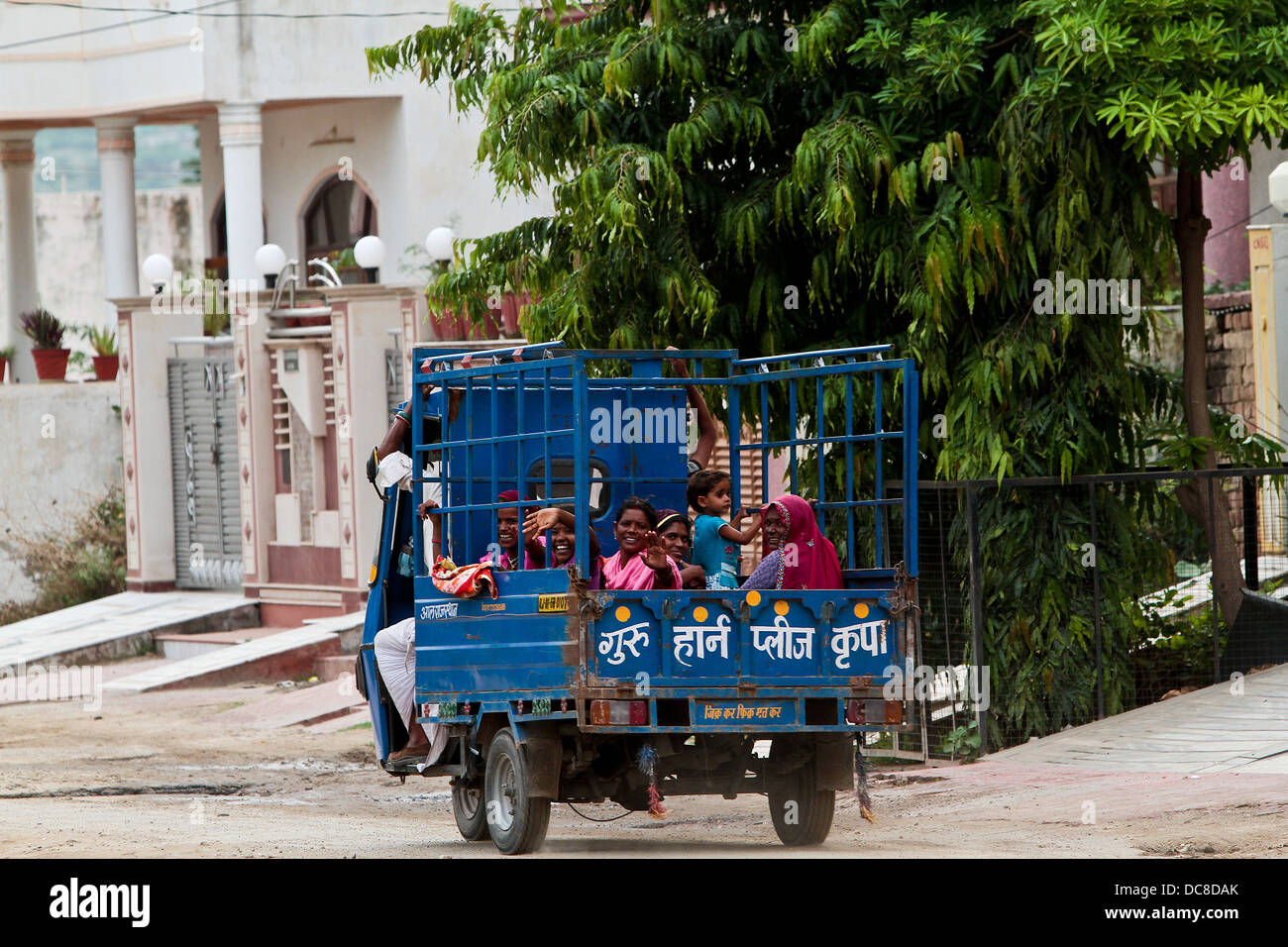 three wheeled bus in India Stock Photo - Alamy