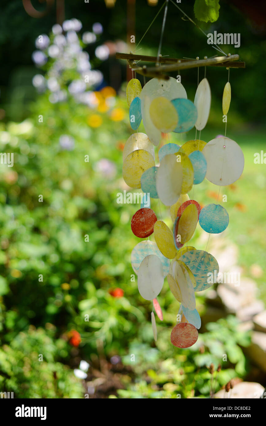 A wind chime in the garden Stock Photo - Alamy