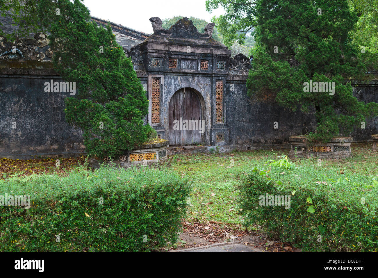 A rustic weathered gate at the Tu Duc Emperors tomb near Hue, Vietnam ...
