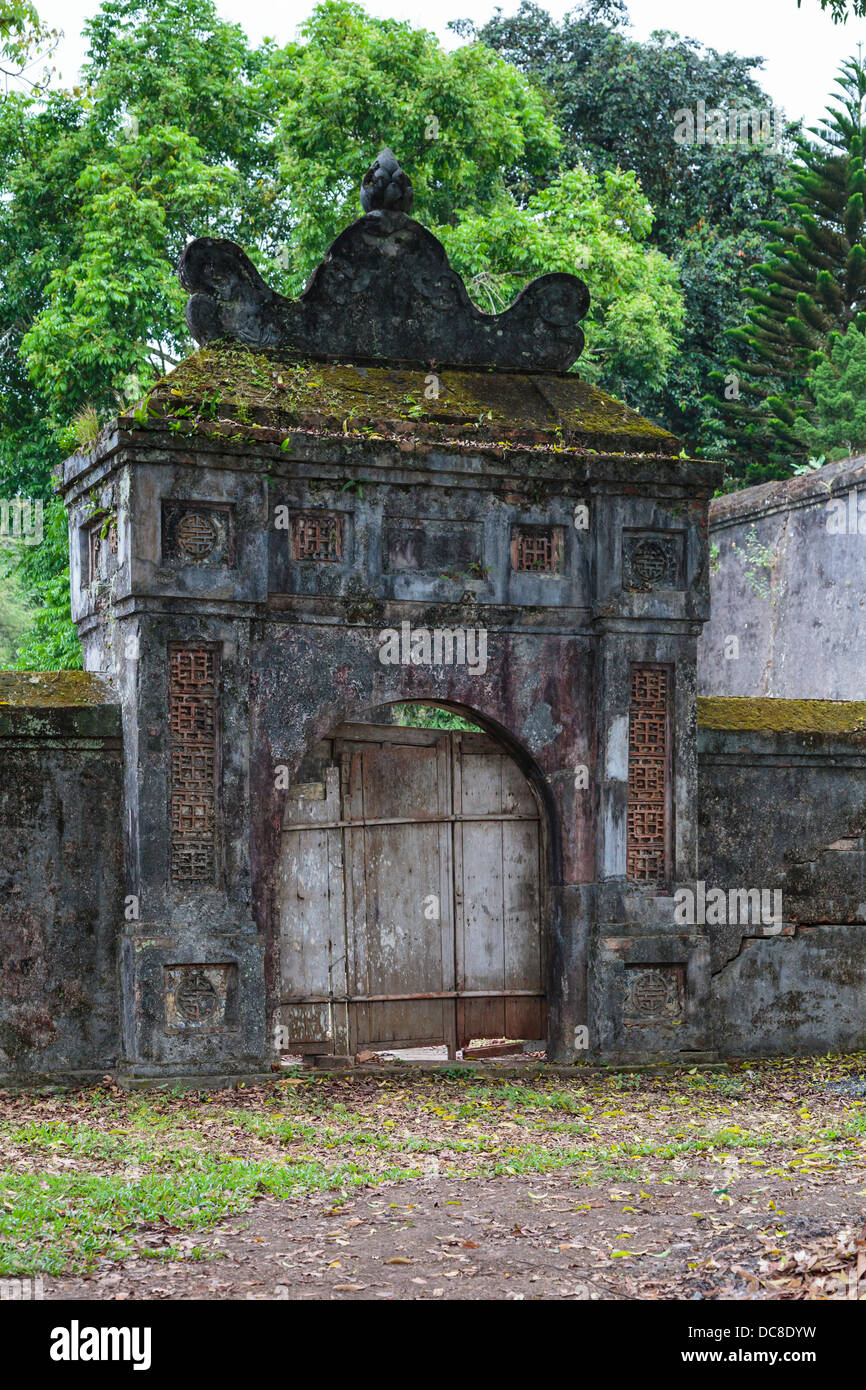 A rustic weathered gate at the Tu Duc Emperors tomb near Hue, Vietnam ...