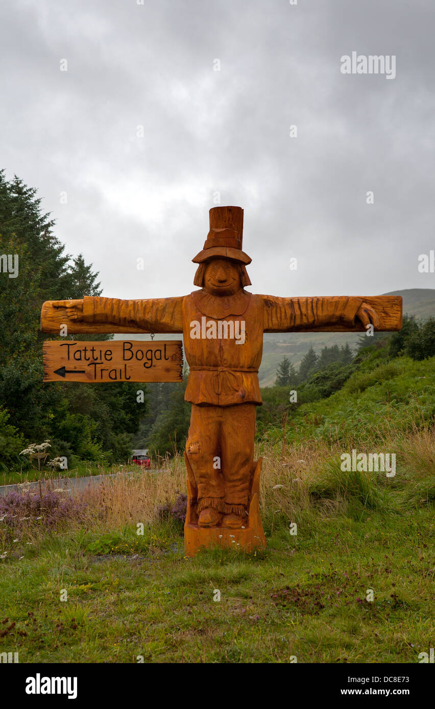 Wooden carved life-size wooden scarecrow type figure on the Isle of ...