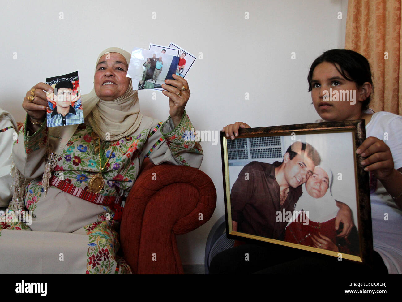 Ramallah, West Bank, Palestinian Territory. 12th Aug, 2013. Ne'ma Mansour, the mother of Esmat ...