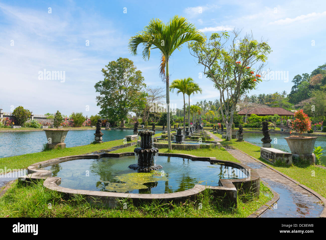 Green tropical park with fountains and ponds, Tirtaganga, Bali Stock ...