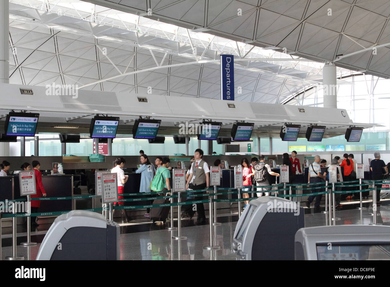 Hong Kong International Airport check in desks Stock Photo - Alamy