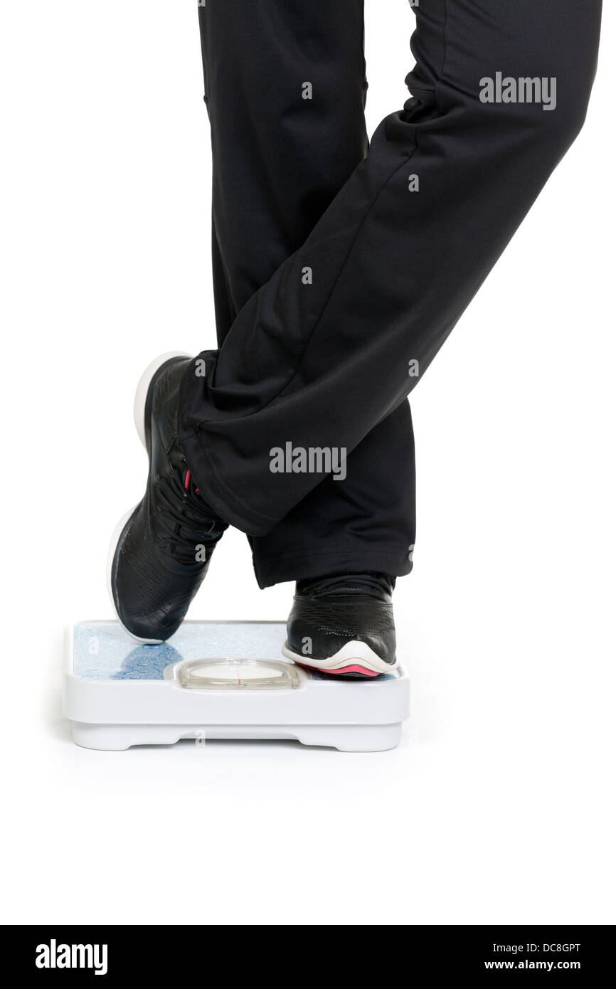 Feet on scales hi-res stock photography and images - Alamy