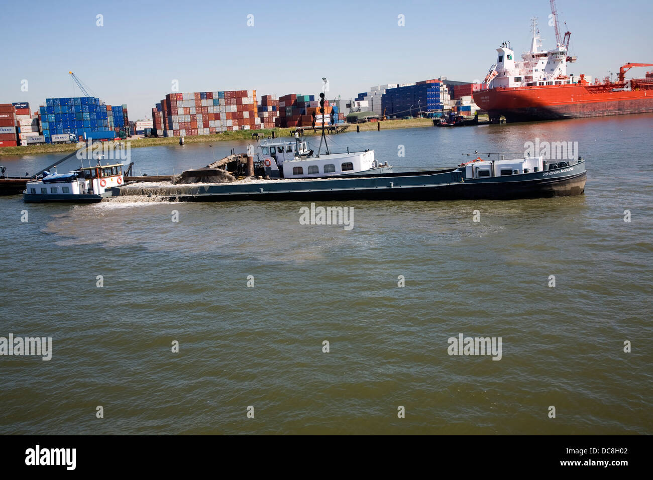 Dredger boat at work Port of Rotterdam, Netherlands Stock Photo - Alamy